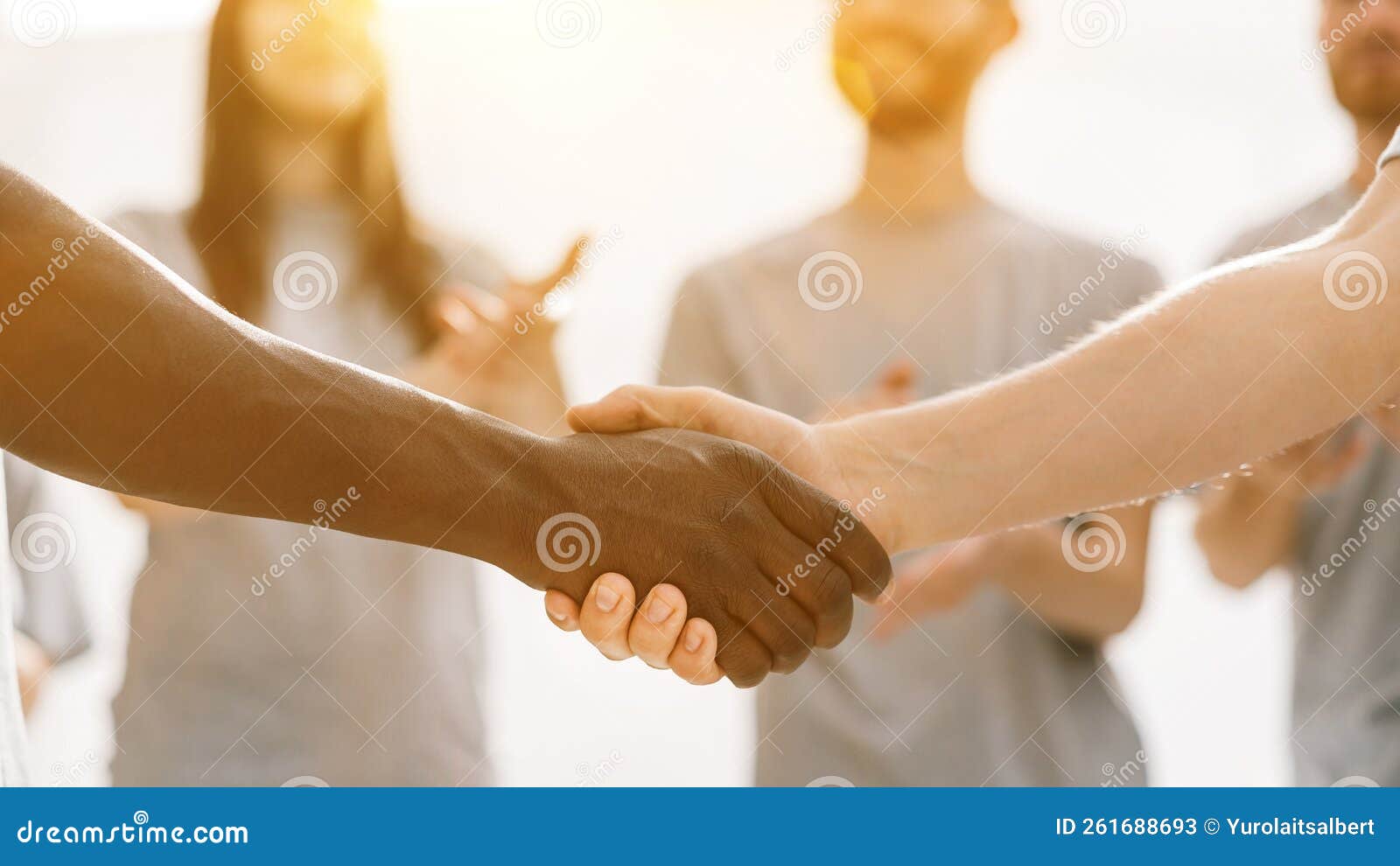 Close Up. Strong Handshake of Two Students of Different Nationalities ...