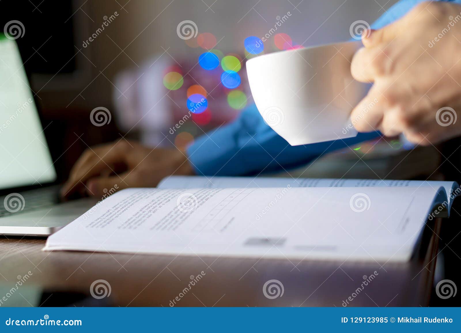 Close Up Student Doing Homework on the Table at Home, Using Naptop and ...