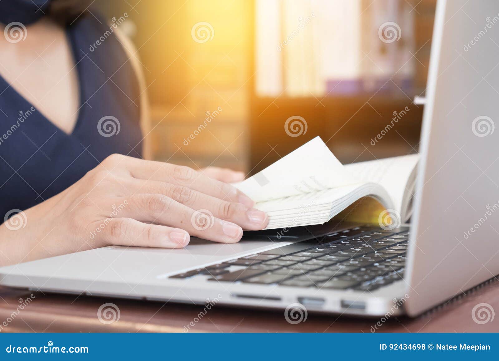 Close Up of Student Hand Reading a Book at Library Vintage Tone. Stock ...