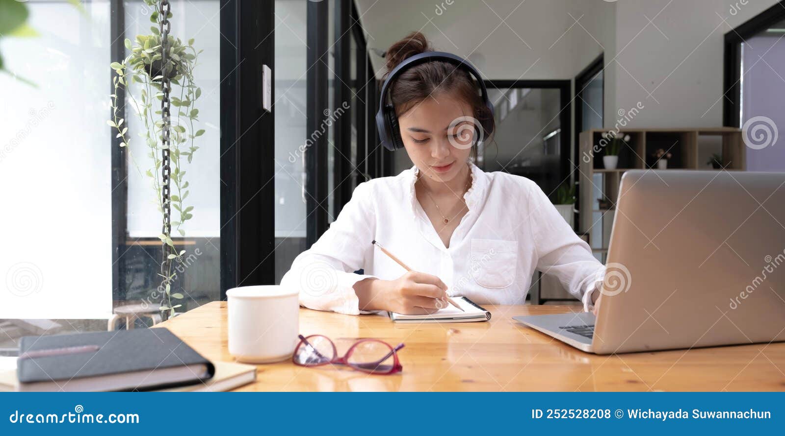 Close Up of Student Learning Online Class by Using Laptop Computer and ...