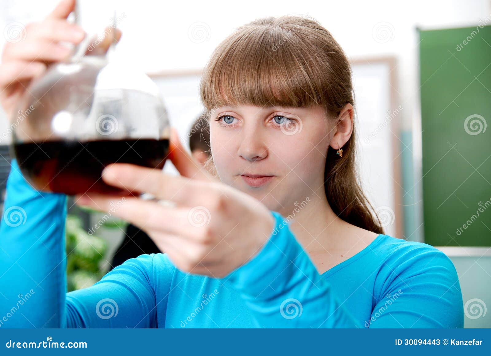 Close-up of a Student Performing an Experiment in Chemistry Lab Stock ...