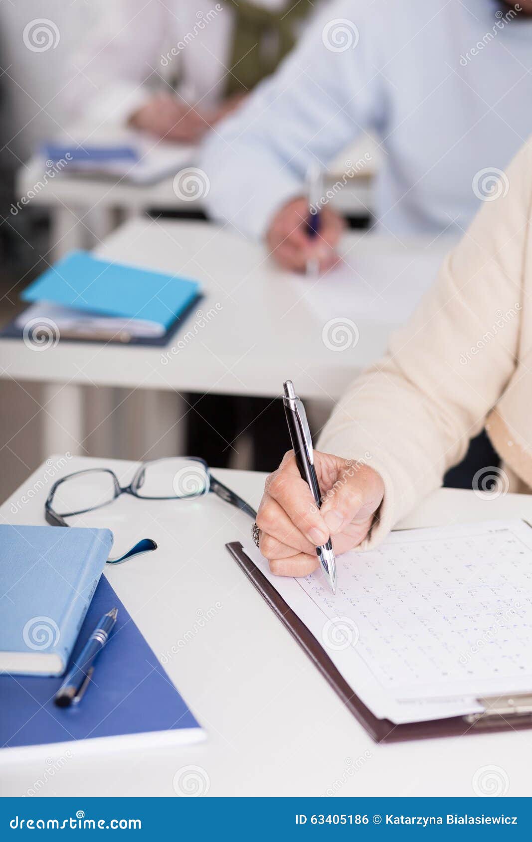 Close-up of Student Writing Exam Stock Photo - Image of paperwork ...