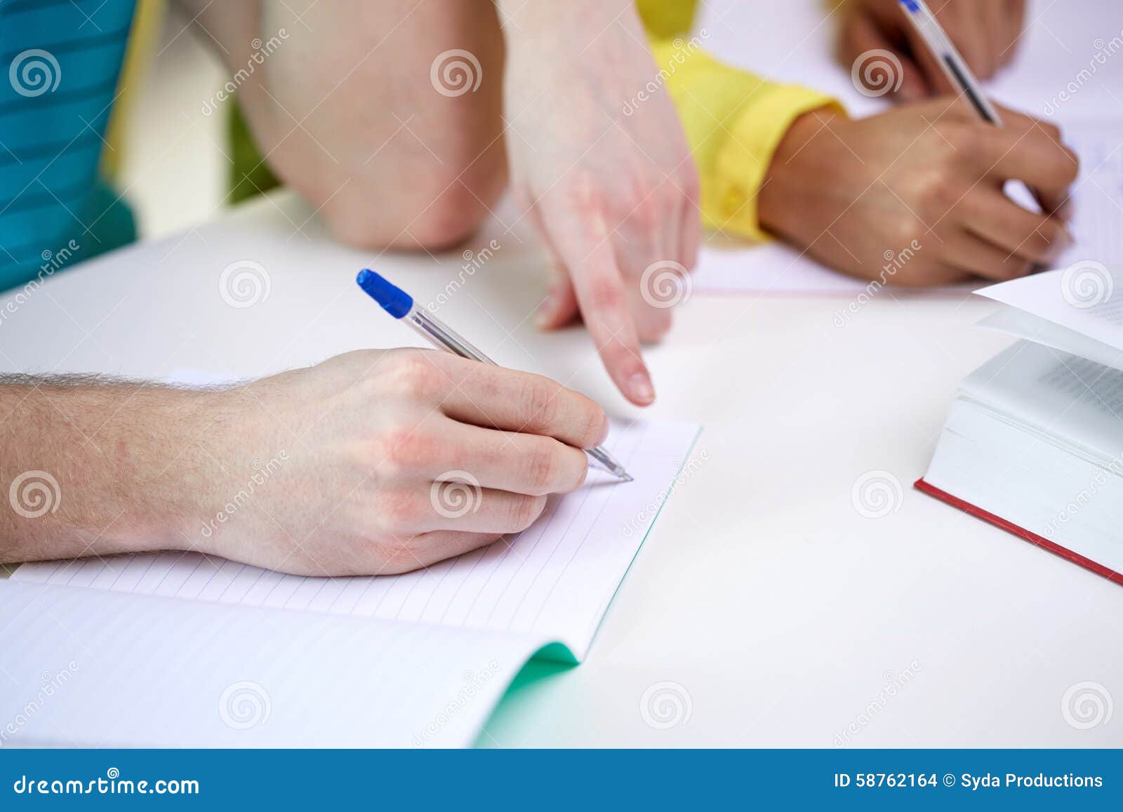 Close Up of Students Hands Writing To Notebooks Stock Photo - Image of ...