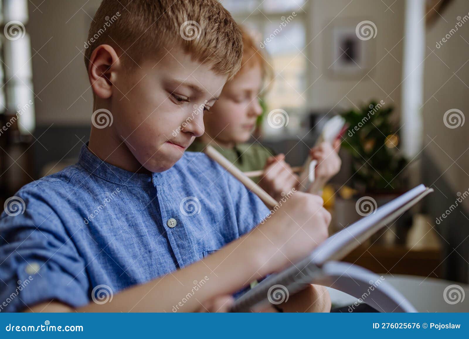 Close Up of Students Writing Notes in To Their Notepads. Stock Photo ...