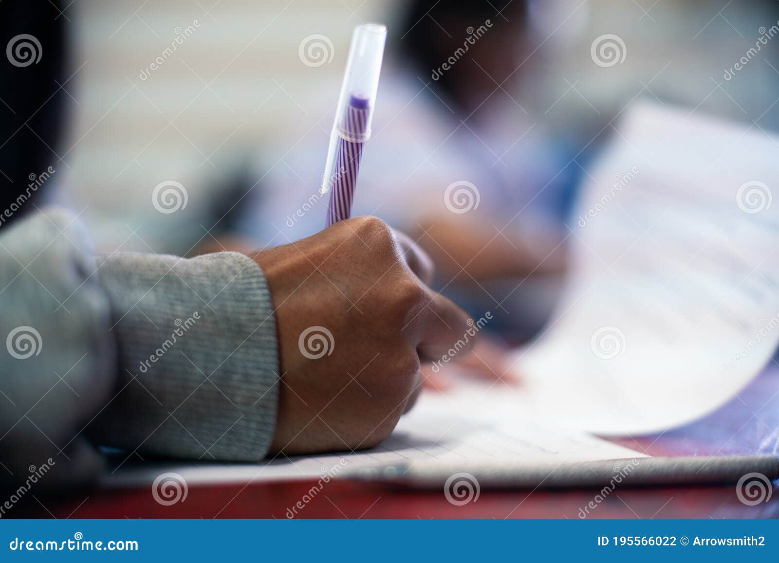 Close Up Students Writing and Reading Exam Answer Sheets Exercises in ...