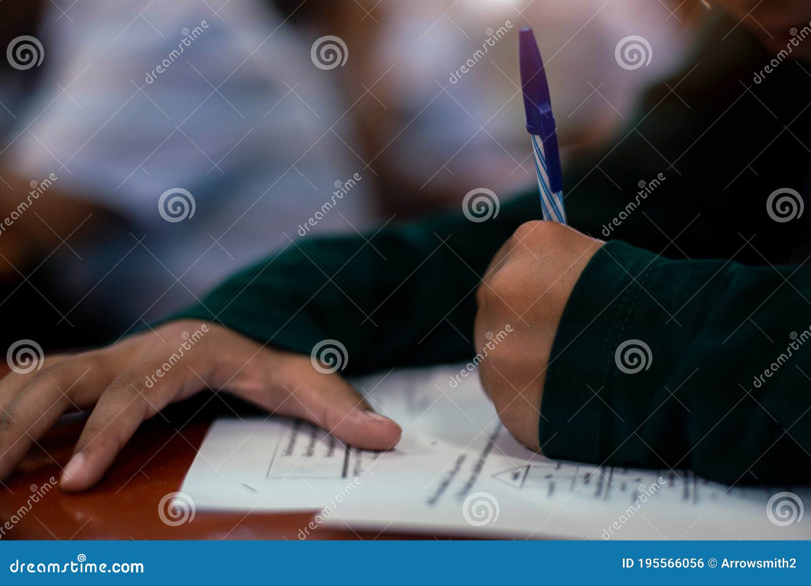 Close Up Students Writing and Reading Exam Answer Sheets Exercises in ...