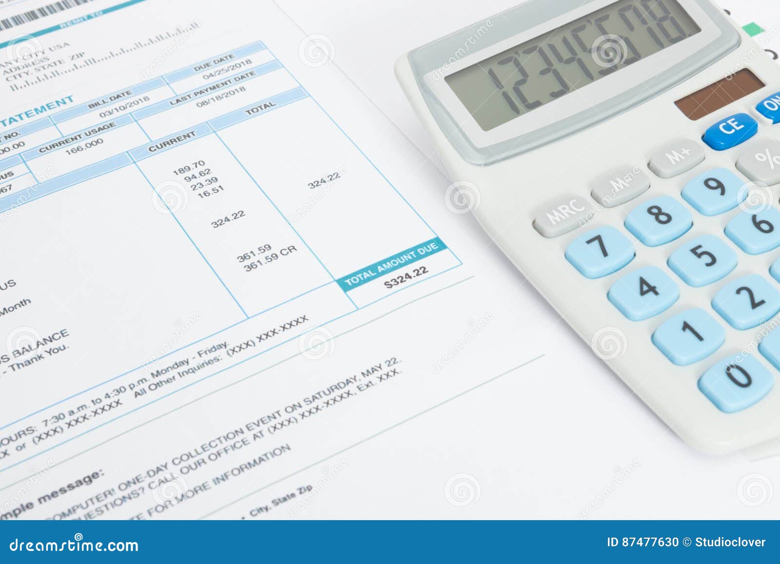 Close Up Studio Shot of Unpaid Utility Bill and Calculator Over it ...