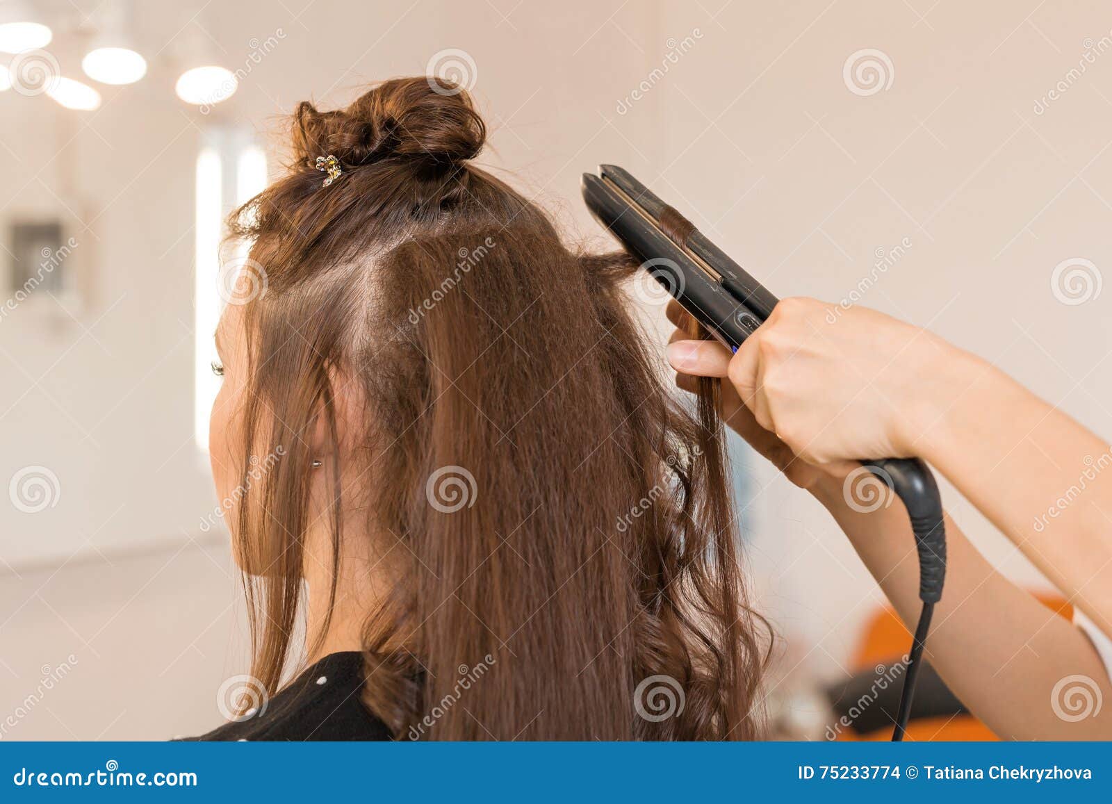 Close Up of Stylist S Hand Using Curling Iron for Hair Curls. Stock ...