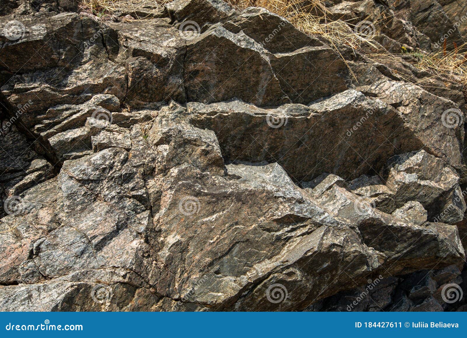 A Close Up of the Surface of the Grey Stone.Close-up of a Rocky Cliff ...
