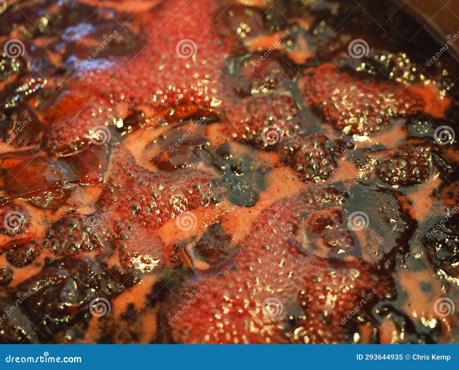 A Close-up of the Surface of Some Boiling Fruit Being Used To Make Jam ...