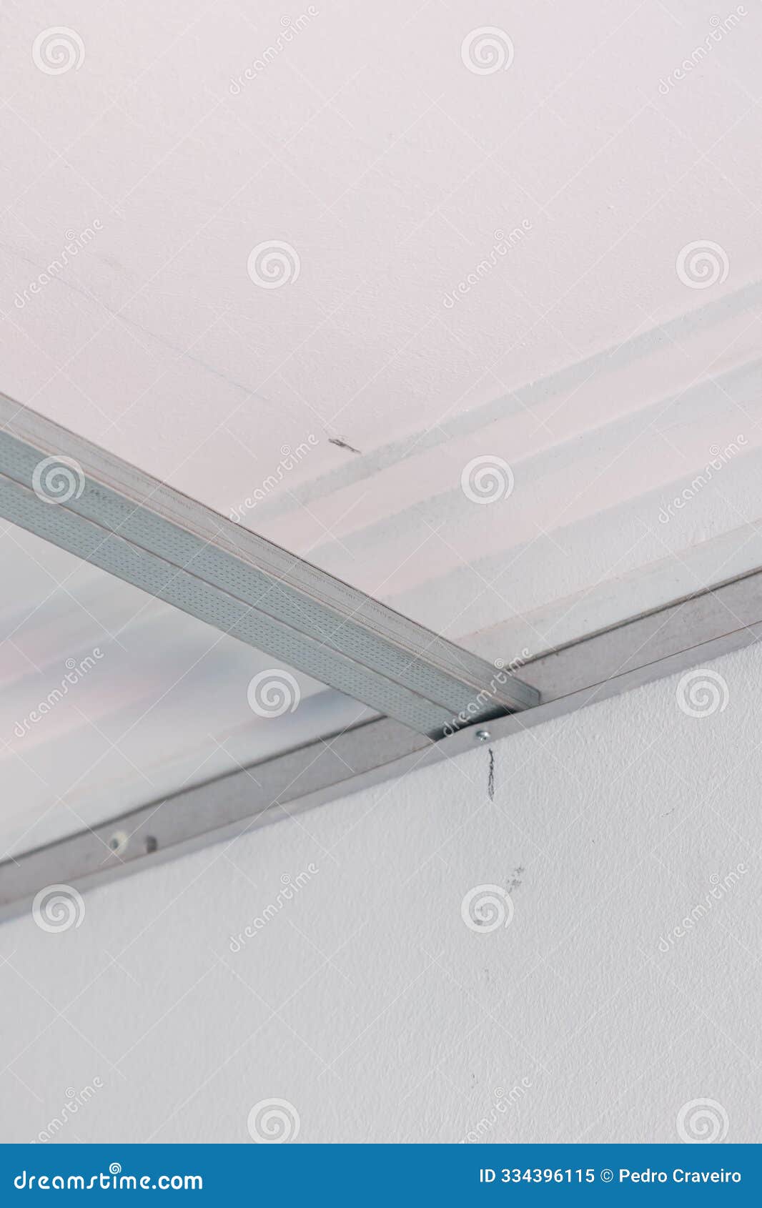 Close-up of a Suspended Ceiling Installation with Visible Metal ...