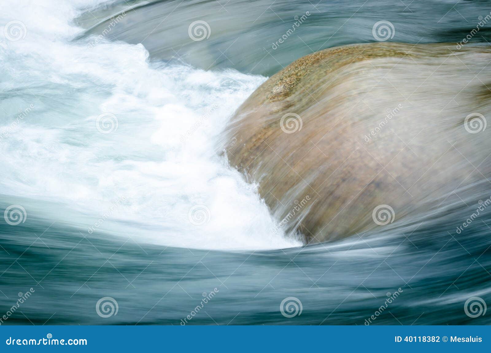 Close Up of a Swiftly Moving Stream with Rock Stock Photo - Image of ...