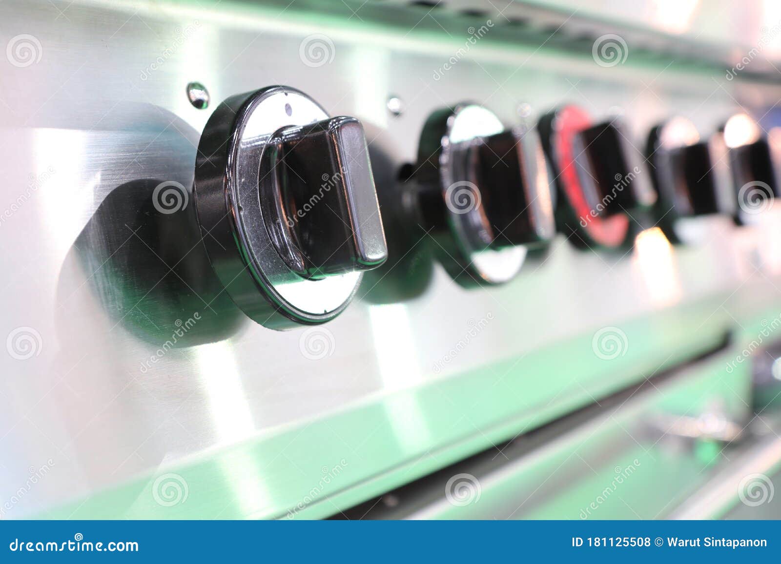 Close Up Switch of Kitchen Burning Gas Cooker ; Knob Stock Photo ...