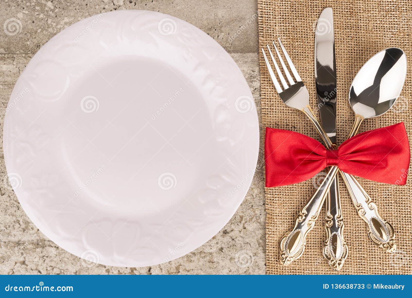 Close Up on Table Settings with a Decorative Red Bow. Stock Image ...