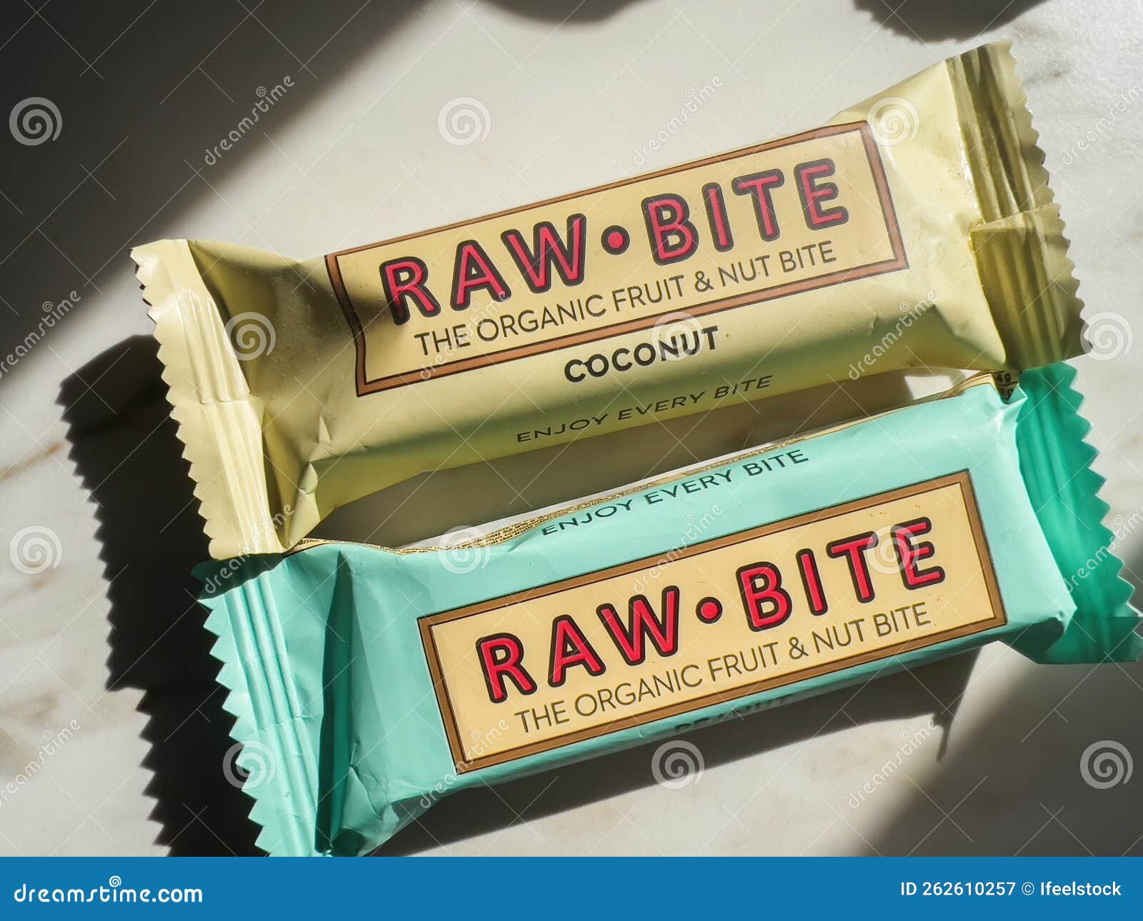 Close-up on a Table of Two Sticks of Raw Bite the Organic Fruit and Nut ...