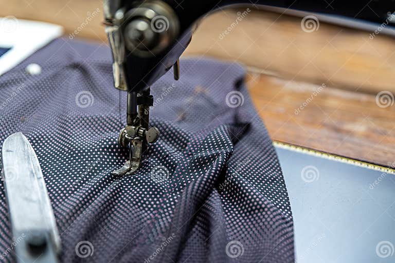Close Up on Tailors Sewing Machine Needle. Stock Photo - Image of ...