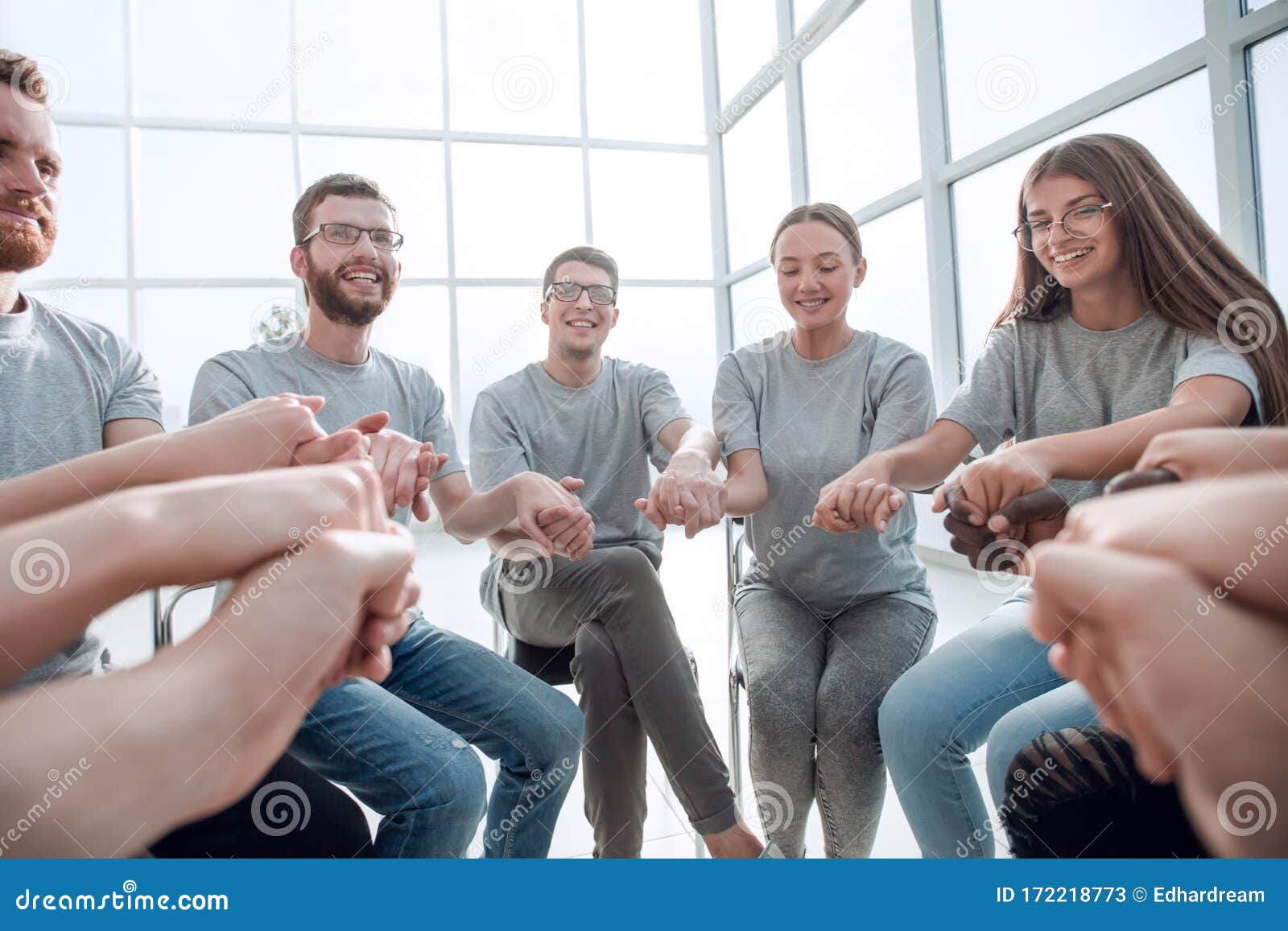 Close Up. a Team of Young People Supporting Each Other Stock Image ...