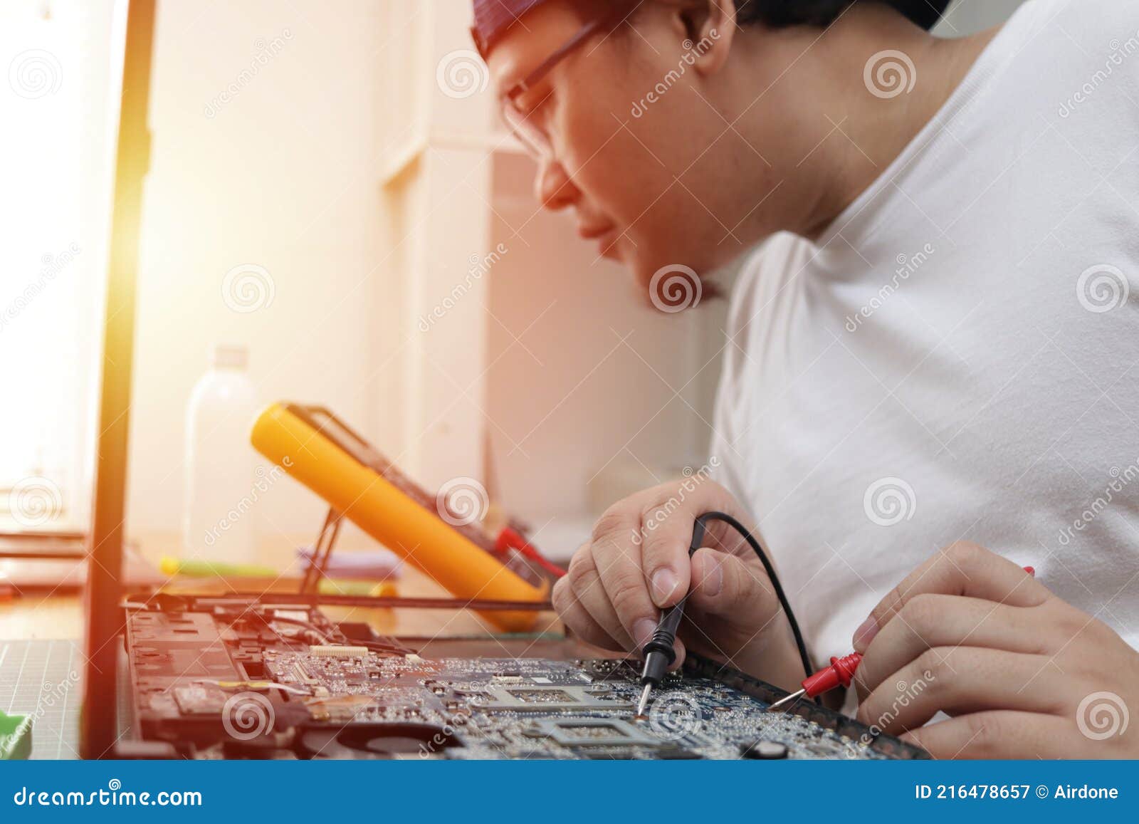 Close Up of Technician Engineer Trying To Repairing Broken Laptop ... Close Up of Technician Engineer Trying To Repairing Broken Laptop ...