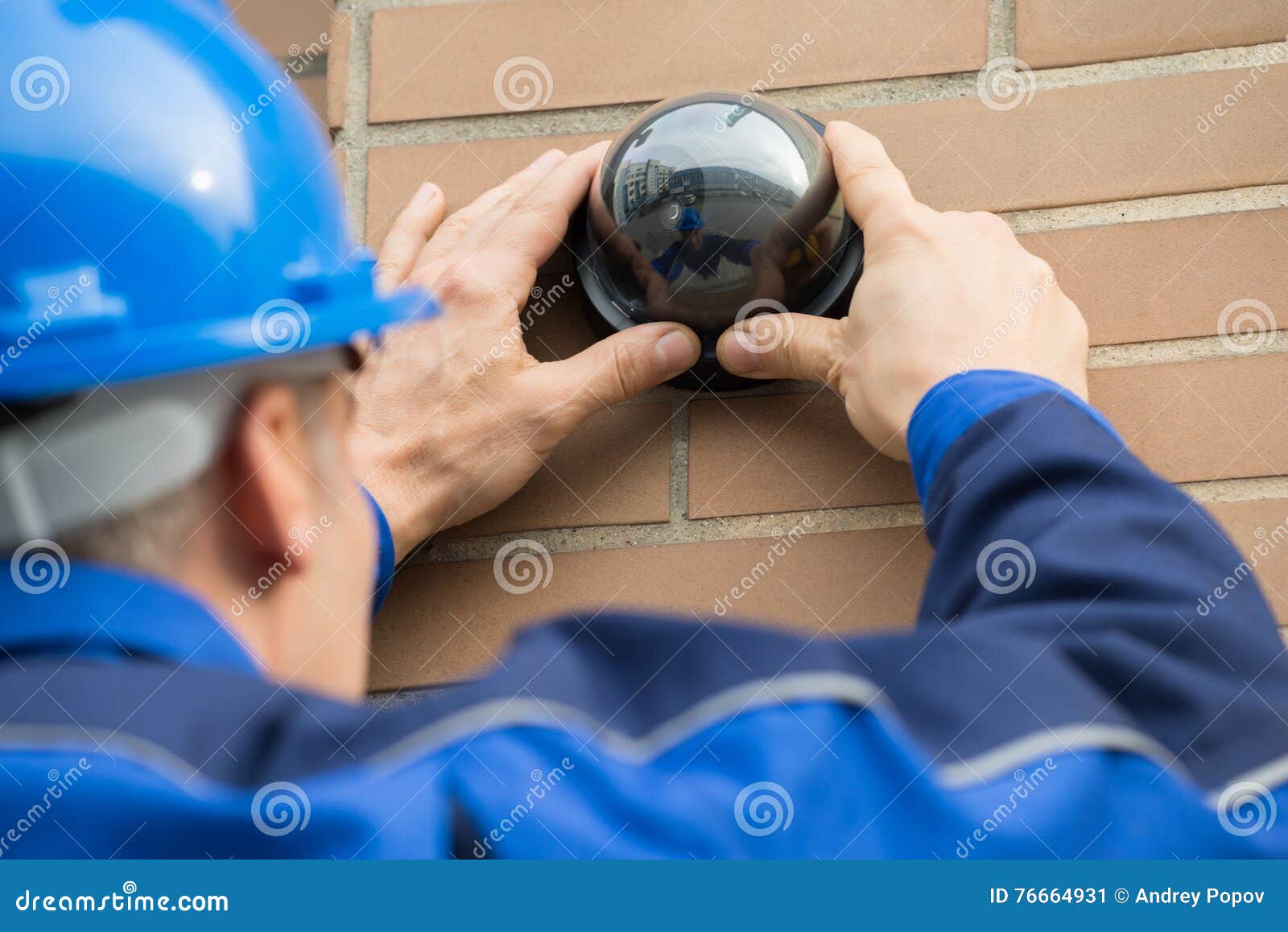 Close-up of Technician Installing Camera in Building Stock Image ...