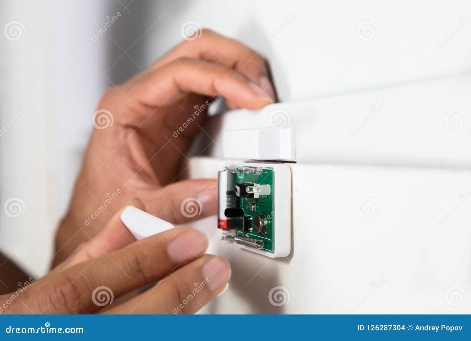 Technician Repairing Security System Door Sensor Stock Photo - Image of ...
