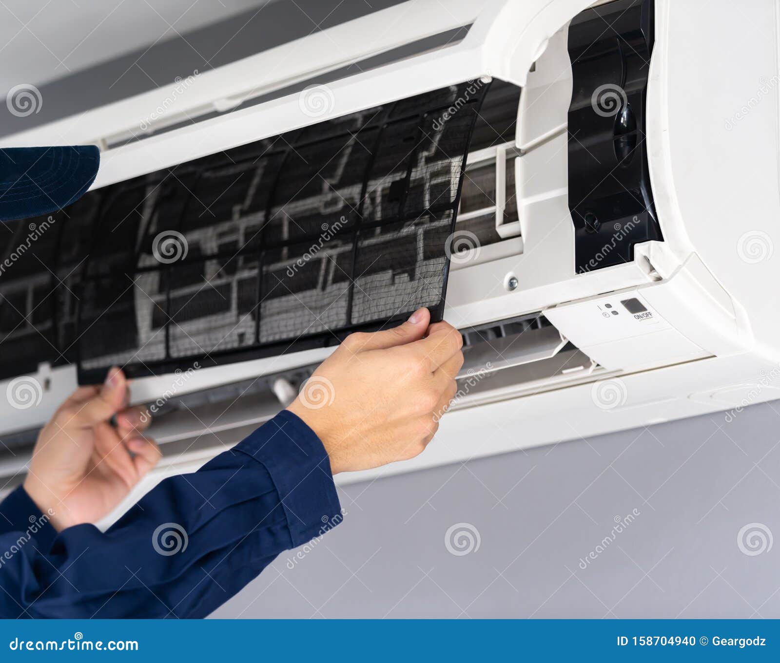 Close Up Technician Service Removing Air Filter of Air Conditioner for ...