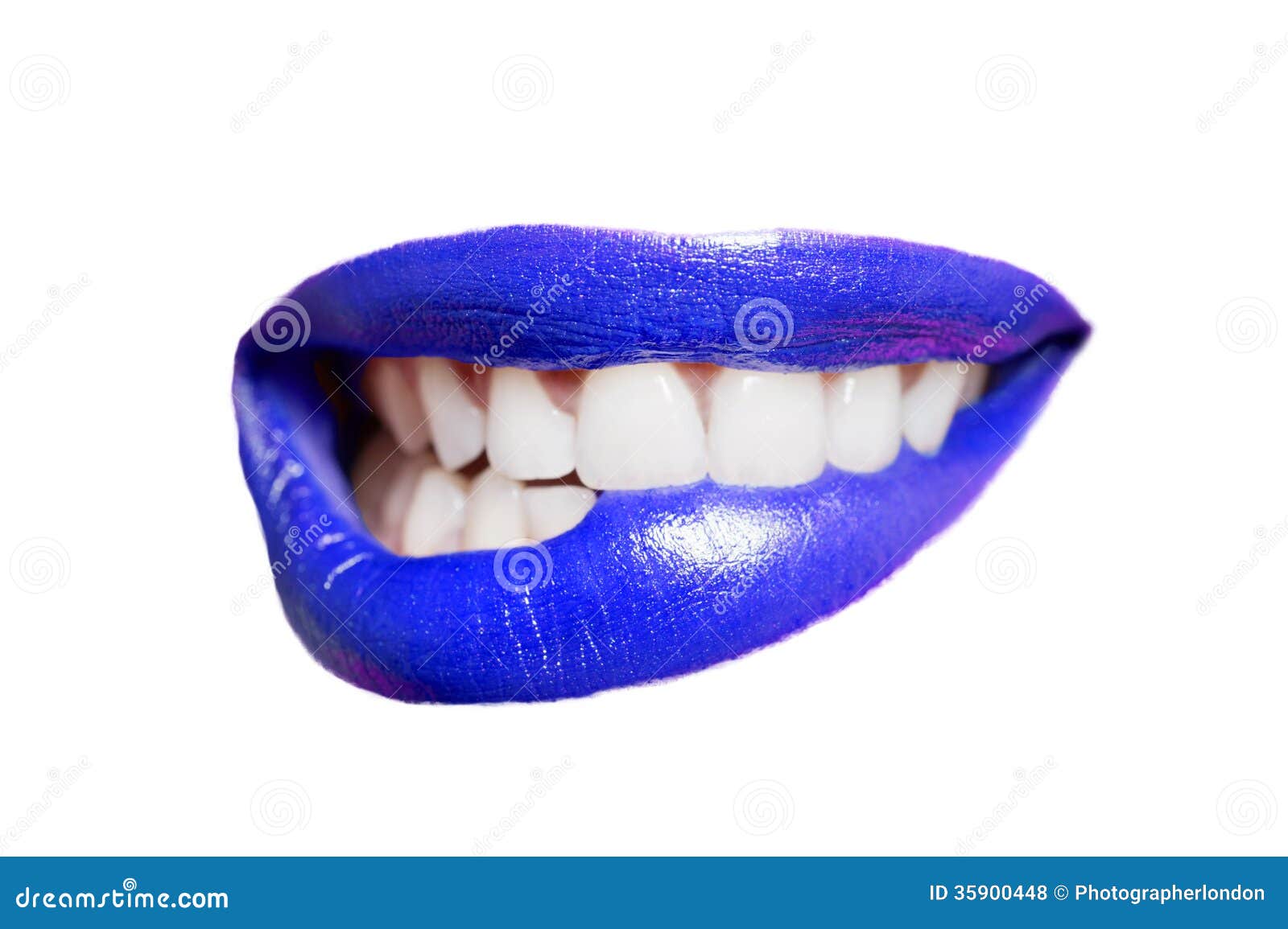 Close-up of Teeth Biting Blue Lip Over White Background Stock Photo ...