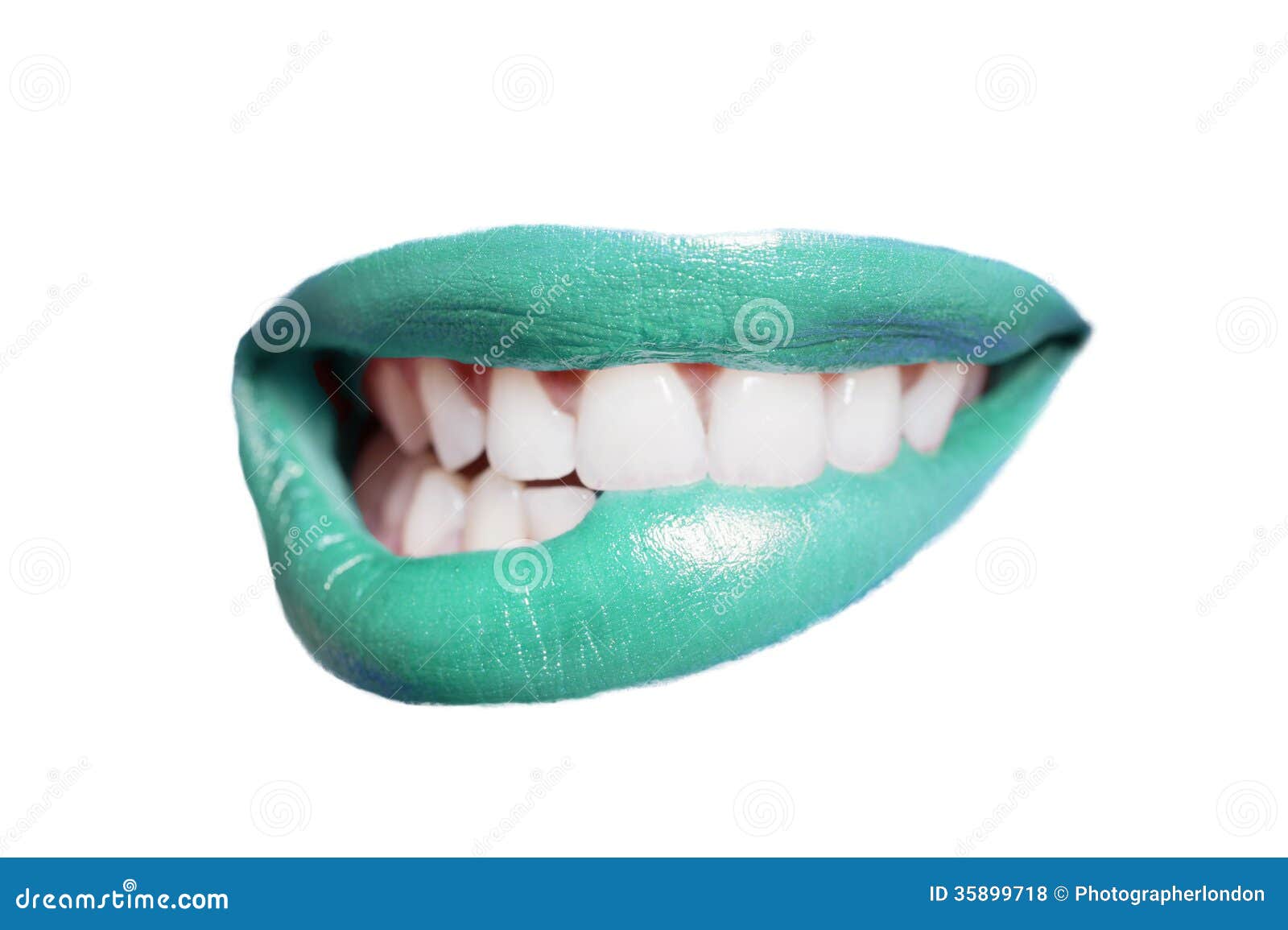 Close-up of Teeth Biting Colored Lip Over White Background Stock Photo ...