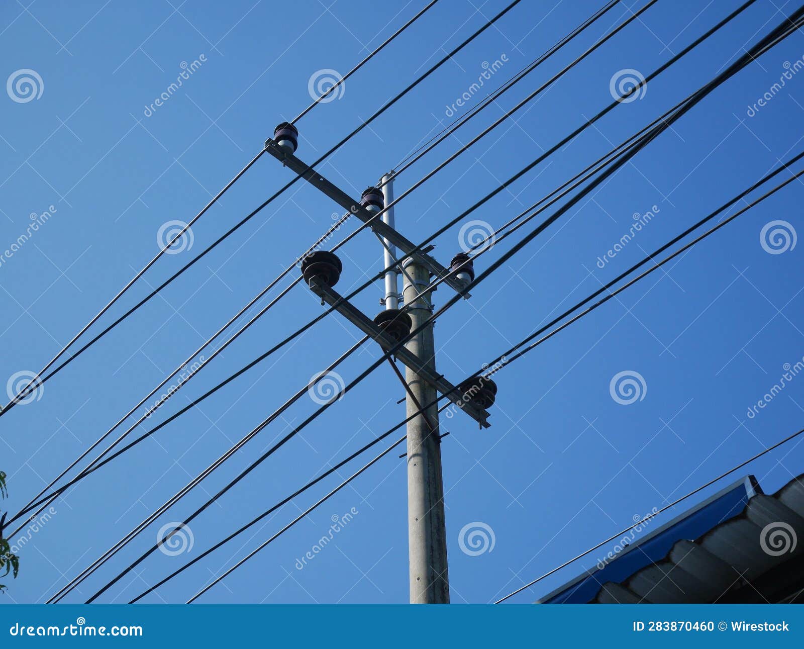 Close-up of a Telephone Pole with Multiple Electrical Wires and Cables ...