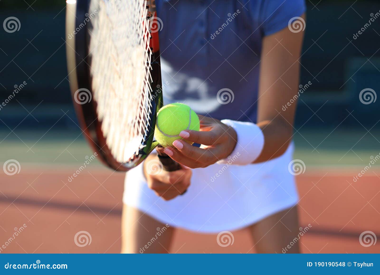 Close Up of a Tennis Player Hitting the Ball with Racket Stock Photo ...