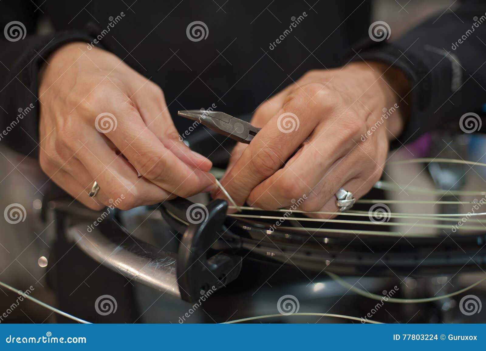 Close Up of Tennis Stringer Hands Doing Racket Stringing Stock Photo ...