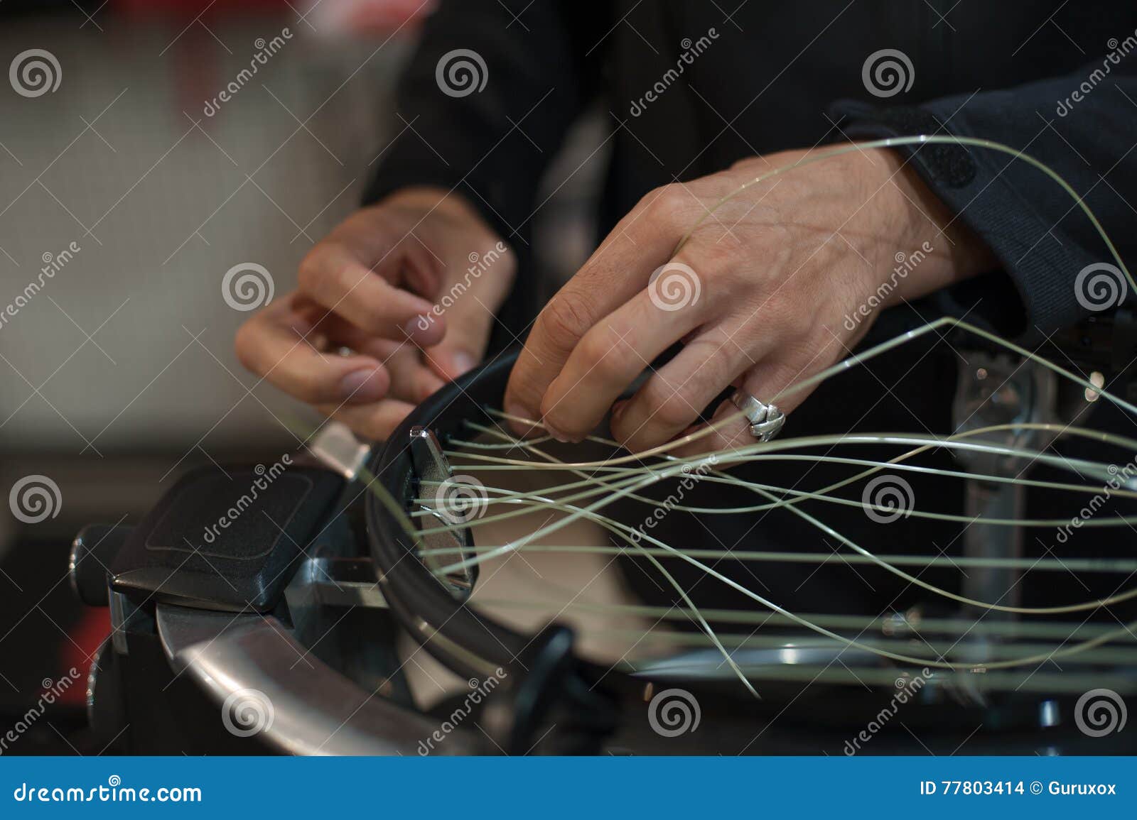 Close Up of Tennis Stringer Hands Doing Racket Stringing Stock Photo ...