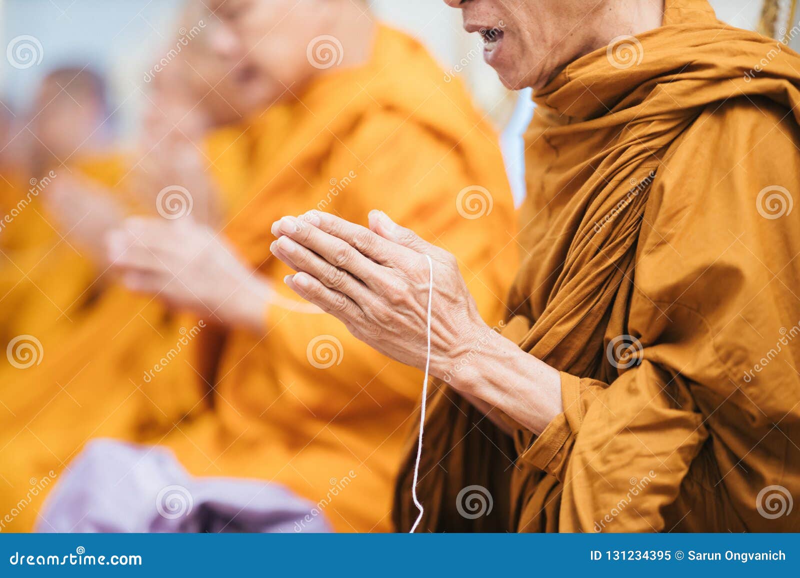 Close Up of Thai Monk Praying Focus at Hand with White Rope. Stock ...