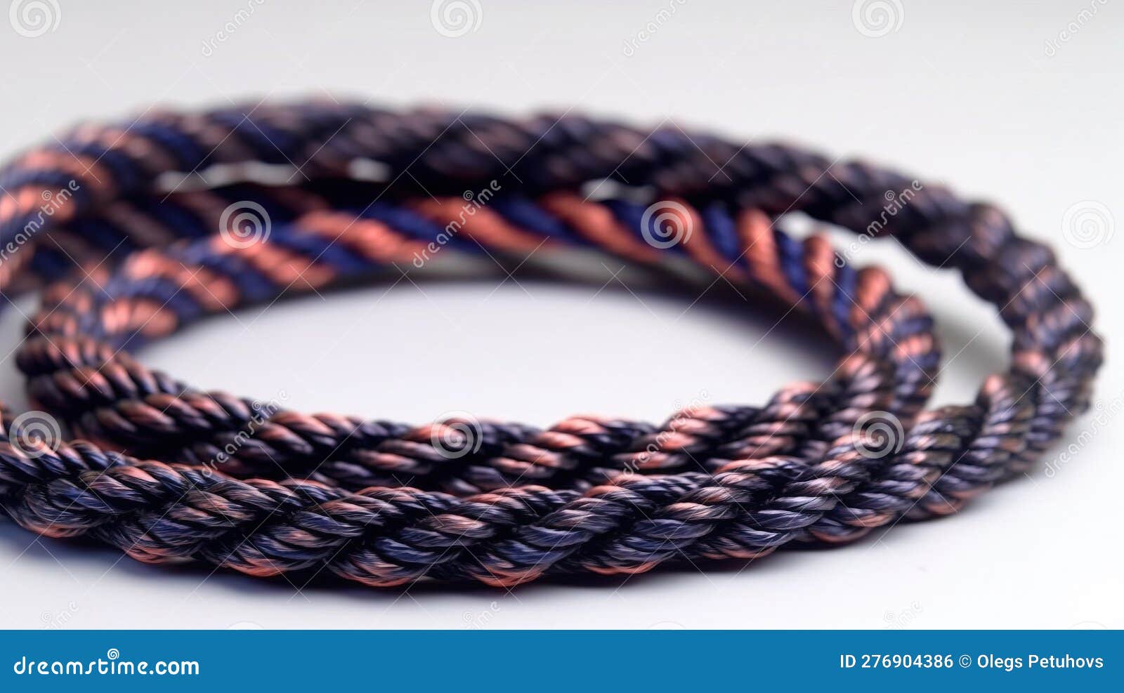 A Close Up of Three Different Colored Ropes on a White Surface Stock ...