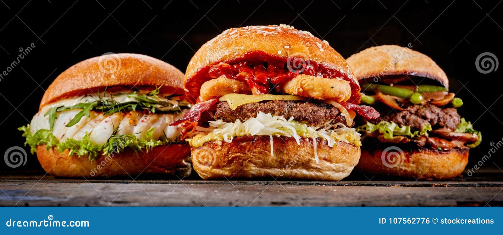 Close-up of Three Different Hamburgers on Table Stock Photo - Image of ... Close-up of Three Different Hamburgers on Table Stock Photo - Image of ...