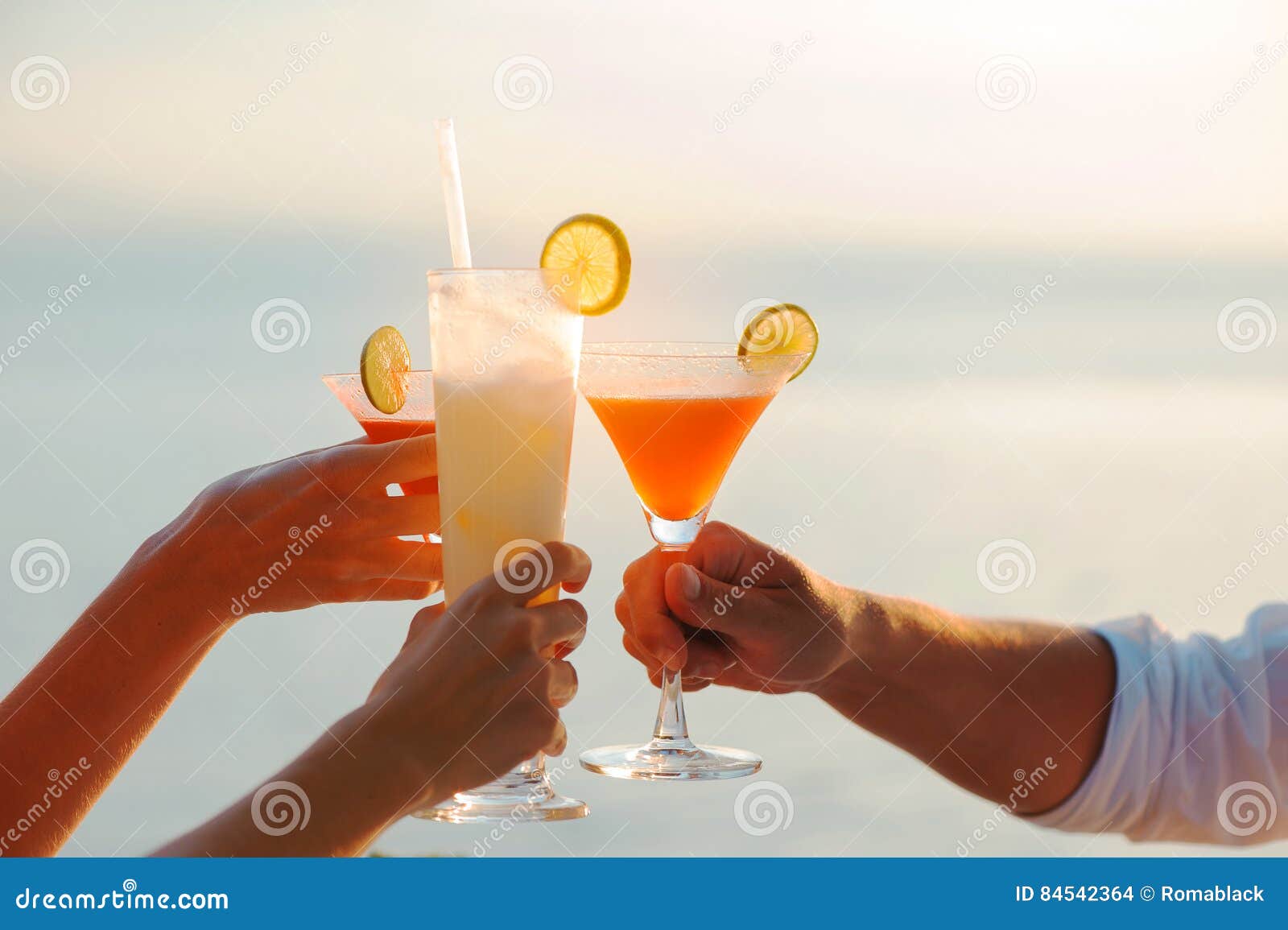 Close Up of Three Friends Clinking with Glasses Cocktail Stock Photo ...