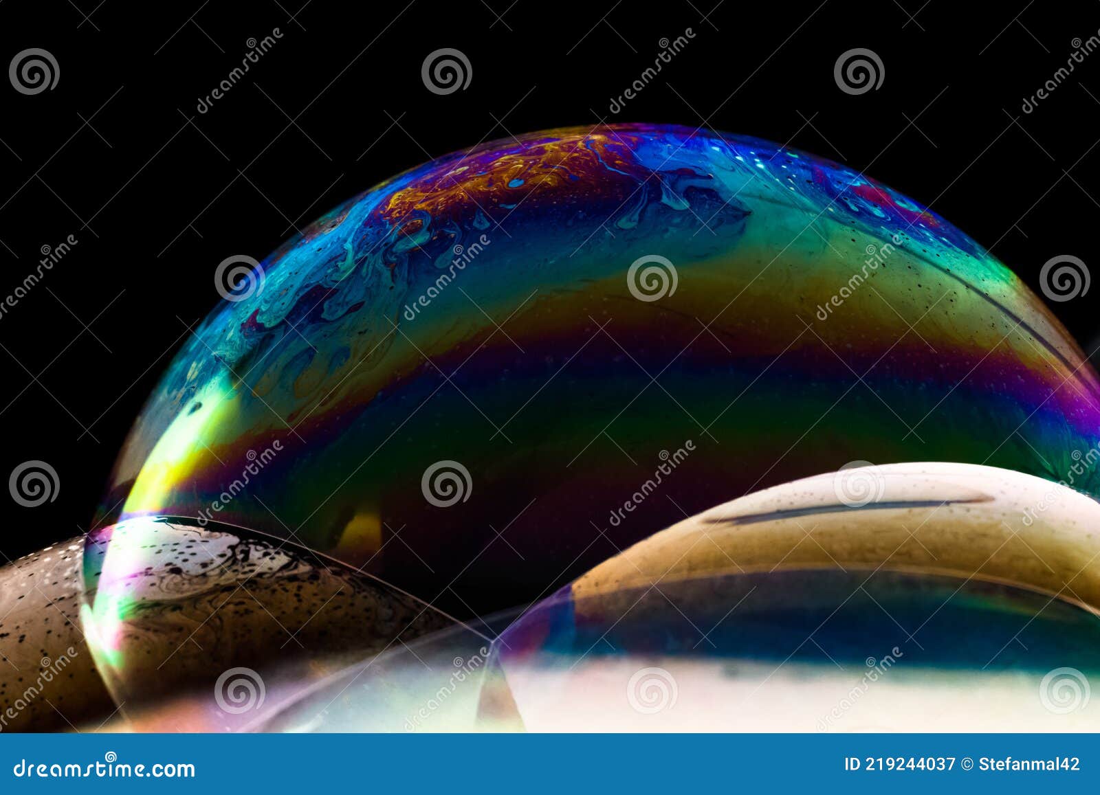 Close Up of Three Stacked Soap Bubbles with Rainbow Colours and ...