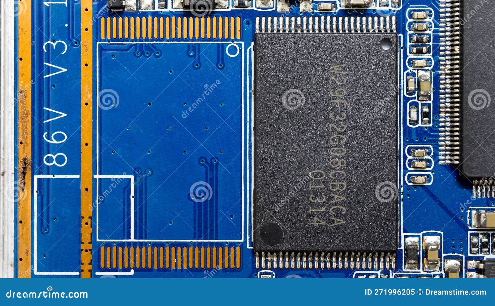 A Small Computer Chip on a Blue and White Piece of Electronics ...