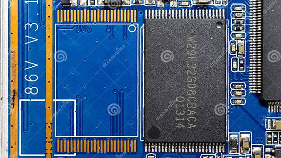 A Small Computer Chip on a Blue and White Piece of Electronics ...