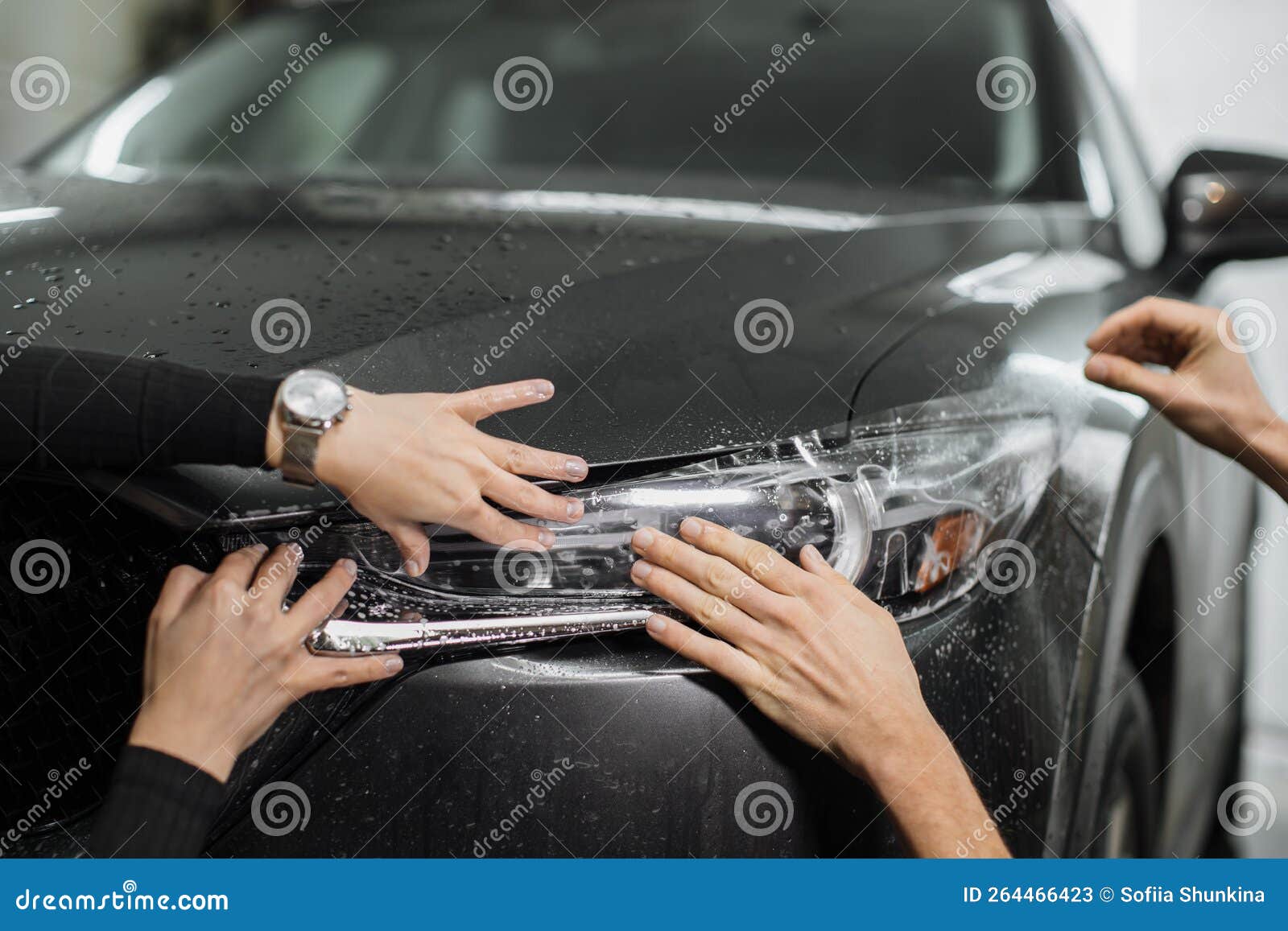 Close Up To PPF Installation Process on a Front Headlight . Stock Image ...