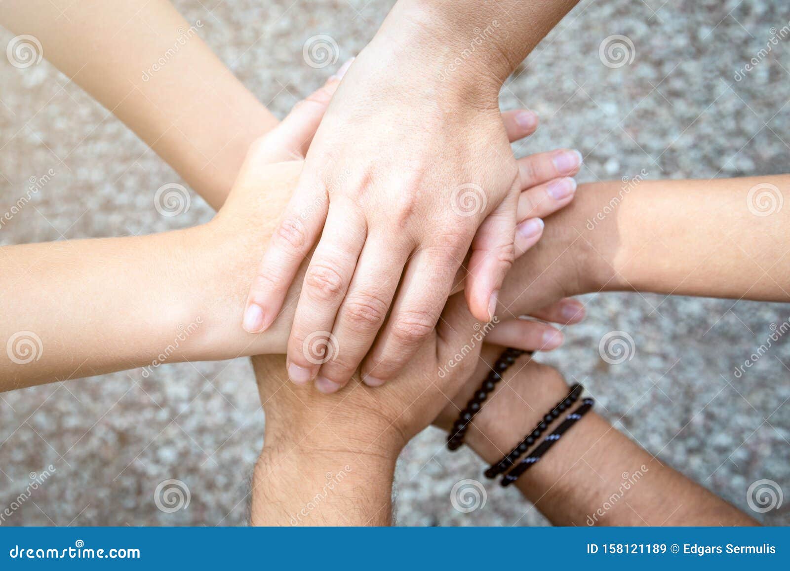 Close Up Top View of People Putting Their Hands Together Stock Image ...