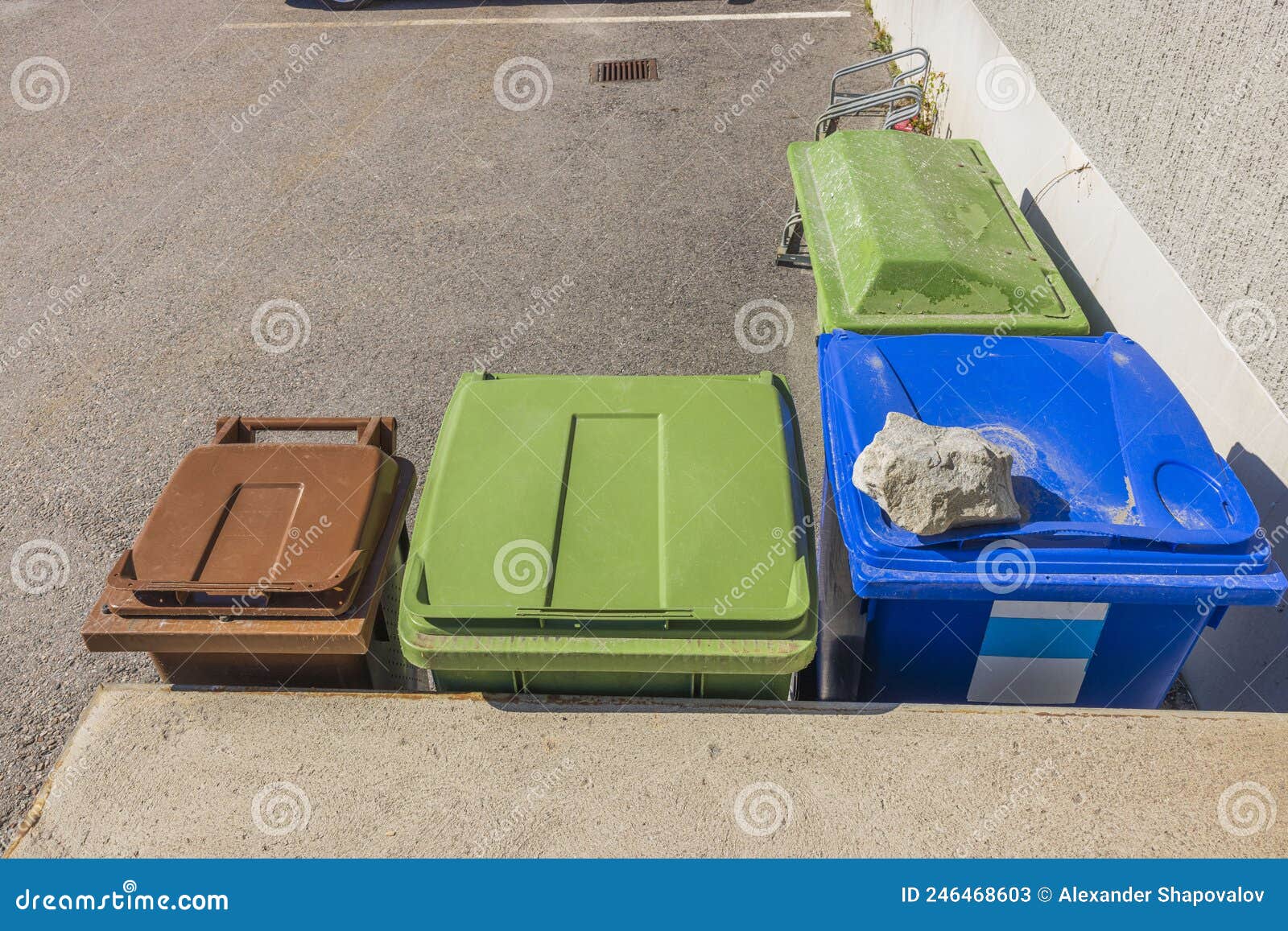 Close-up Top View of Three Garbage Sorting Bins and Sand Container ...
