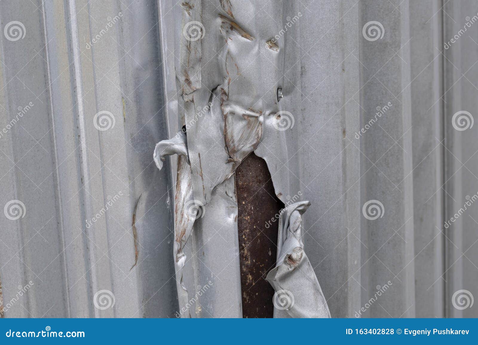 Close-up of a Torn Sheet of Metal after a Collision with a Car Stock ...