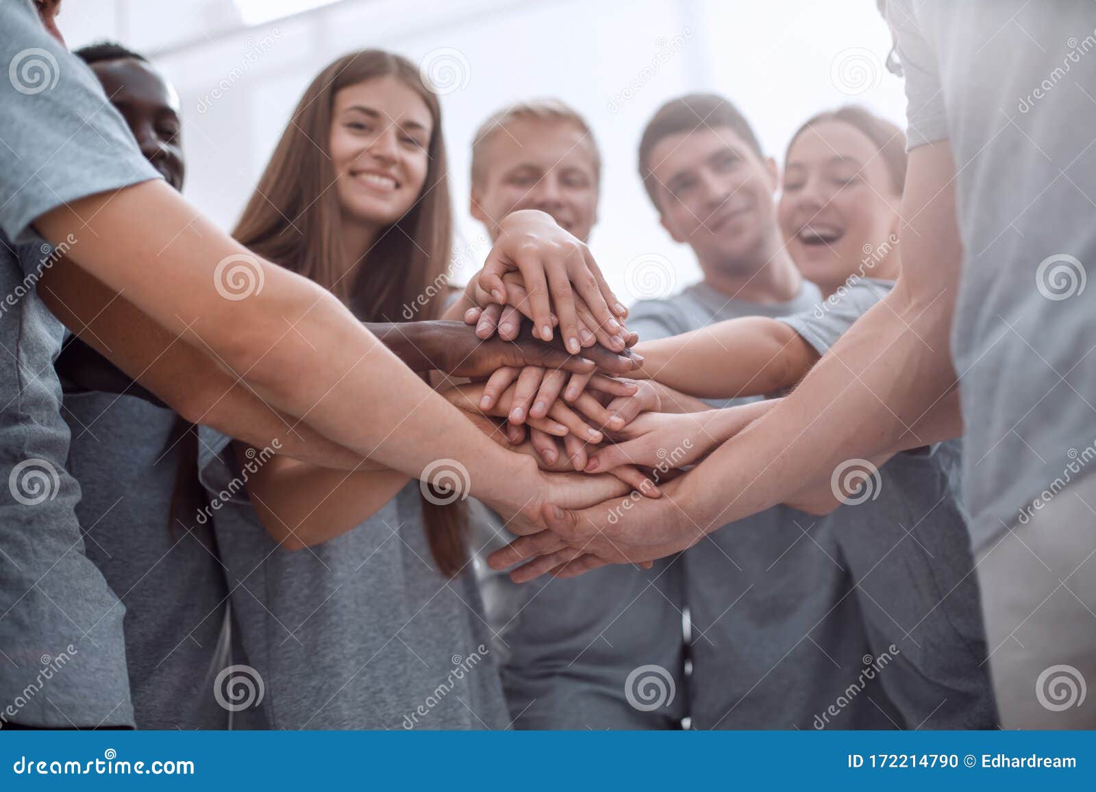 Close Up. Tower from the Hands of a Young Team Stock Photo - Image of ...