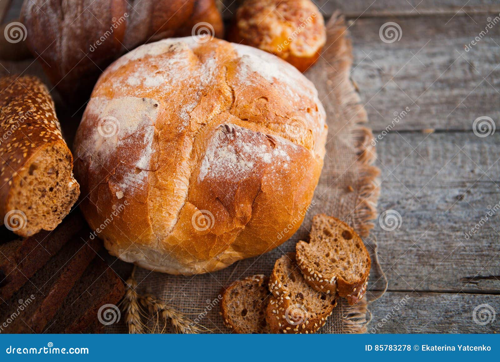 Close-up of Traditional Fresh Bread on Rustic Table Stock Photo - Image ...