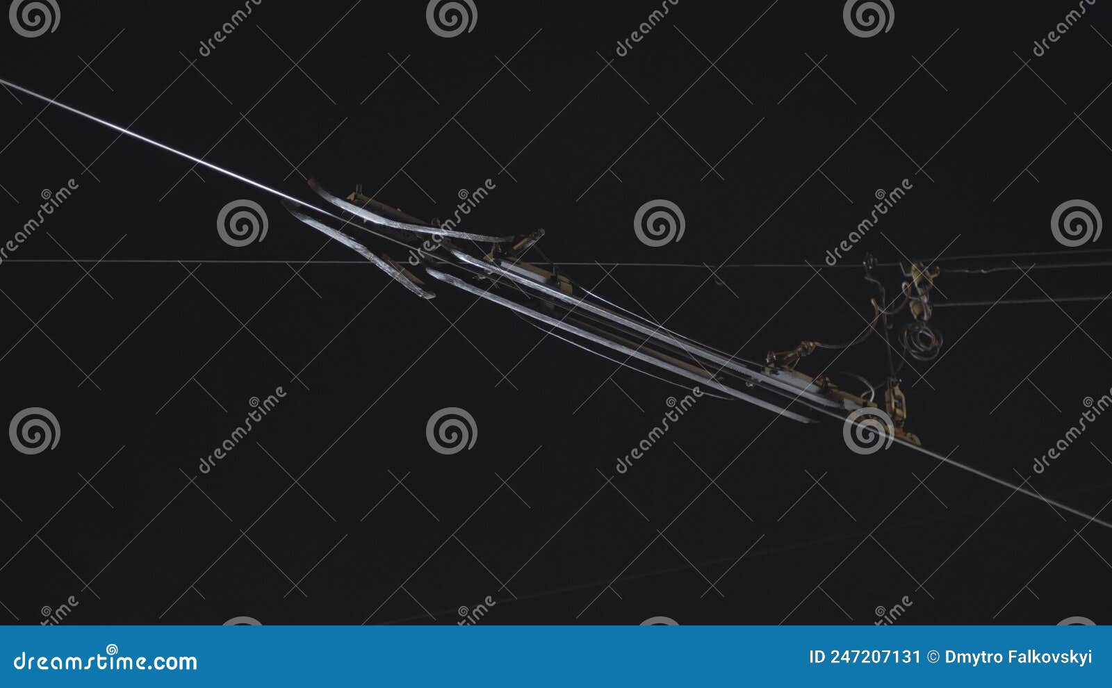 Close-up of a Tram Power Line through Which a Tram Pantograph Passes ...