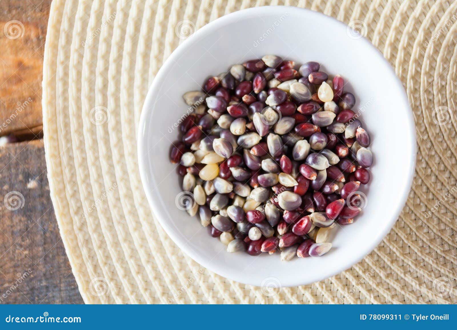 Close Up of Tri Color Popcorn Kernels in a White Bowl with Selective ...