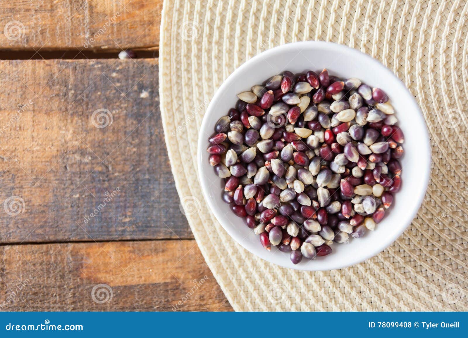 Close Up of Tri Color Popcorn Kernels in a White Bowl with Selective ...