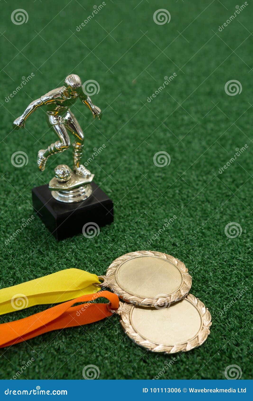 Trophy and Medals on Artificial Grass Stock Photo - Image of sports ...