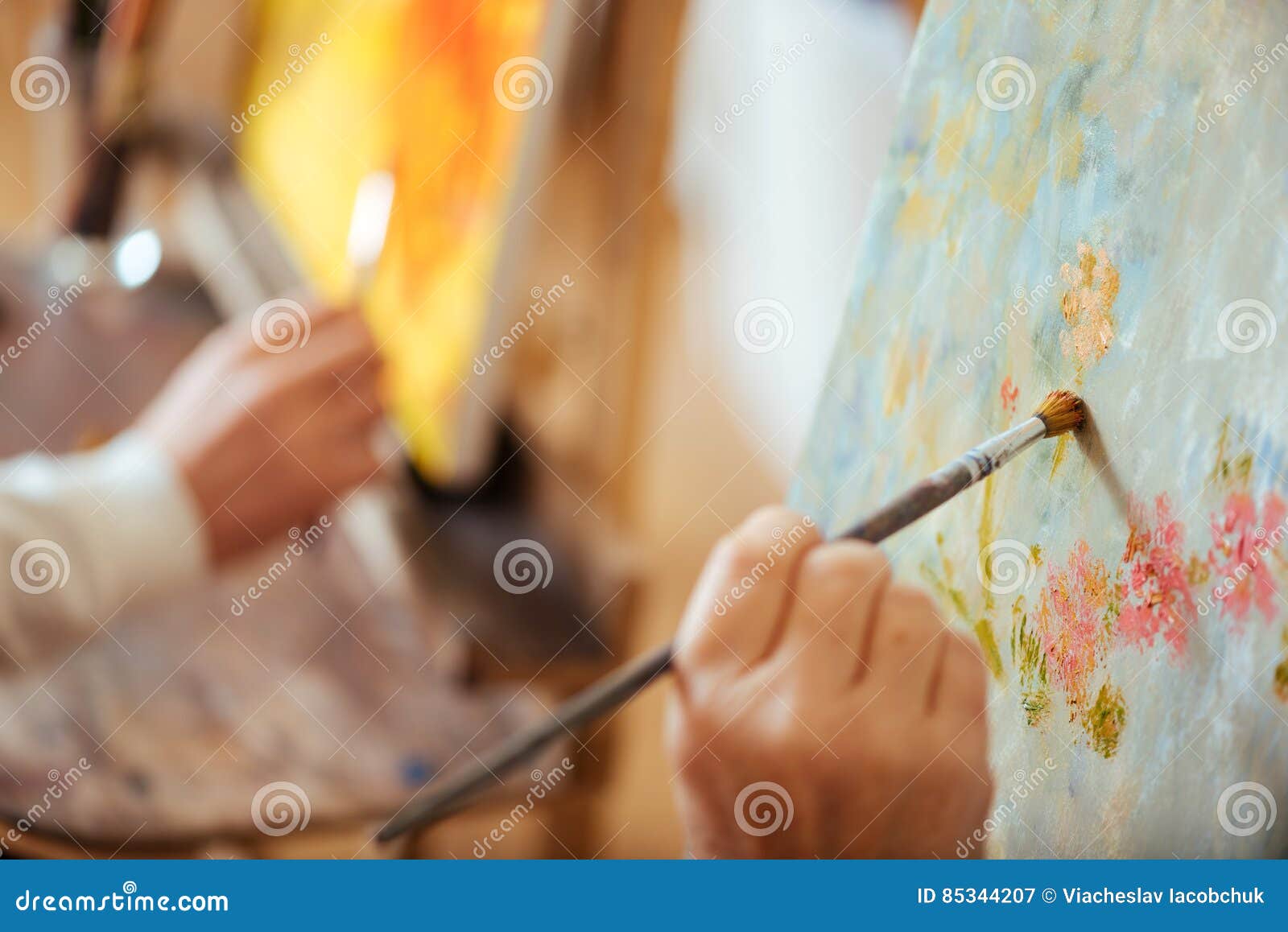 Close Up of Two Artists Hands Painting Pictures with Brushes Stock ...