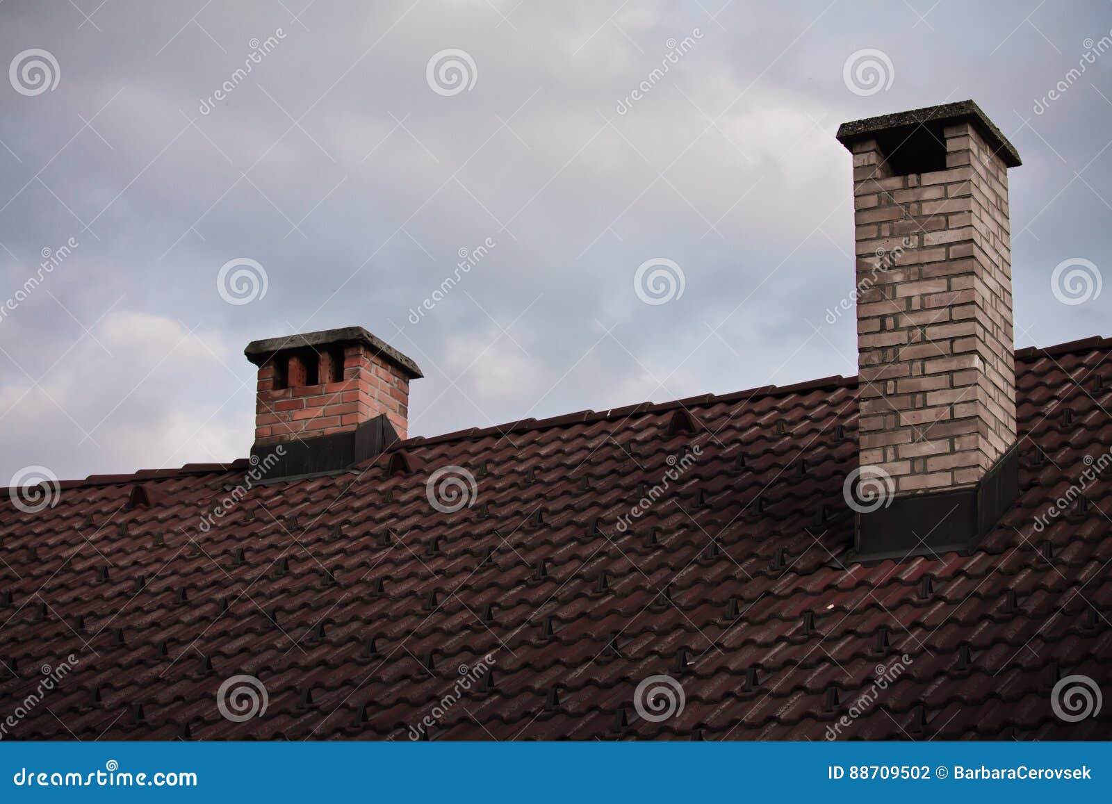 Close Up on Two Brick Chimney on Rooftop Isolated in Sky Stock Photo ...